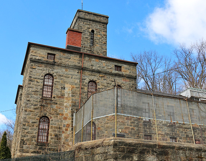 The imposing stone facade of the Old Jail Museum looks like it was designed by someone who really, really didn't want overnight guests to extend their stay.