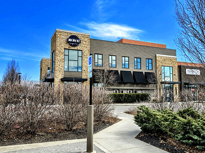 Bru Burger Bar's striking stone-and-glass facade makes a bold architectural statement in Westerville, like a delicious fortress dedicated to the noble burger arts.