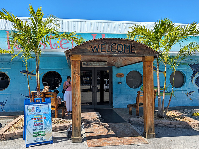 The turquoise exterior isn't just Florida kitsch&mdash;it's a maritime beacon for hungry travelers. Painted fish swim eternally across walls that have witnessed countless seafood pilgrimages.