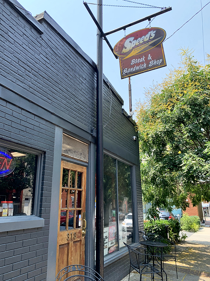 The unassuming gray brick exterior of Speed's hides culinary treasures within, like a sandwich speakeasy waiting to be discovered.
