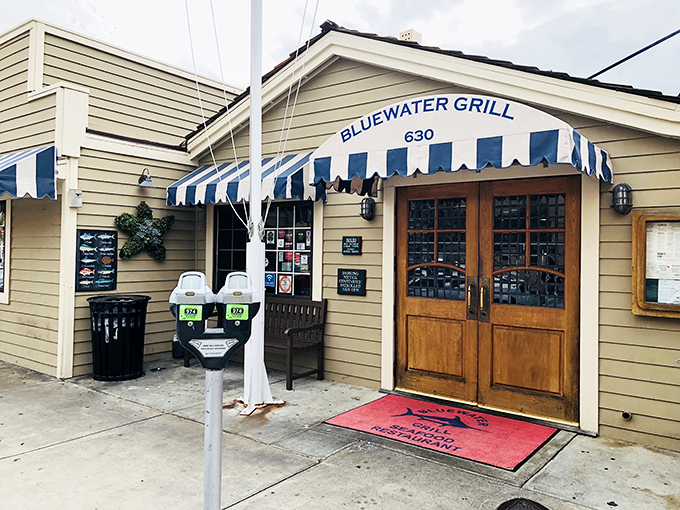 Bluewater Grill's waterfront deck beckons like a siren song, promising seafood treasures with that million-dollar Newport Harbor view.