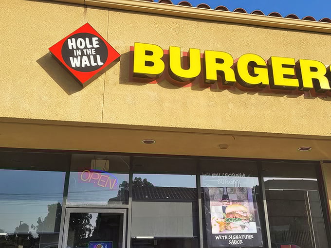 The unassuming storefront that launched a thousand cravings. Like Clark Kent's phone booth, this beige exterior hides superhero-level burgers inside.