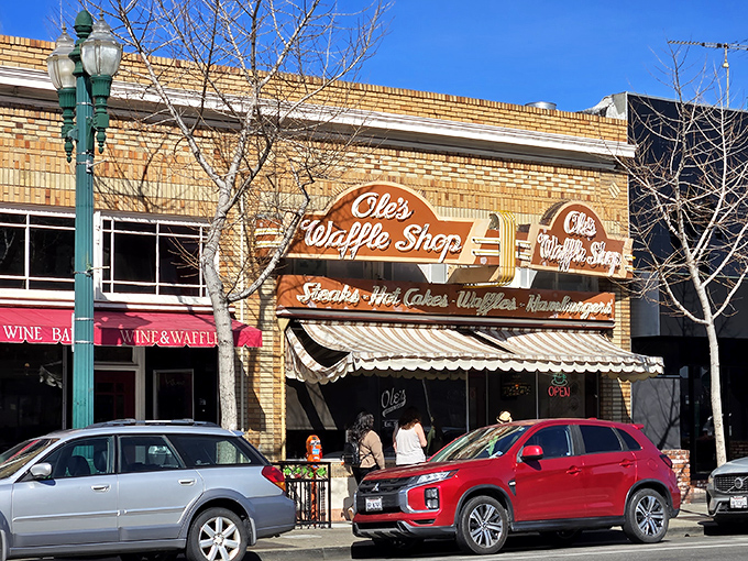 The brick facade of Ole's Waffle Shop stands as a beacon of breakfast hope on Alameda's Park Street, promising comfort food that's outlasted countless food trends.