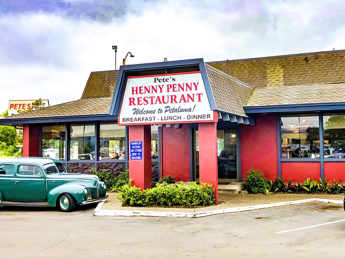 The bright red exterior of Pete's Henny Penny stands like a beacon of breakfast hope, promising comfort food that doesn't need fancy frills to be extraordinary.