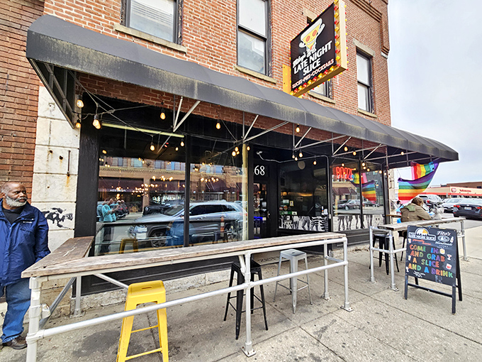 The unassuming brick exterior of Mikey's Late Night Slice beckons like a lighthouse to hungry souls wandering downtown Columbus.