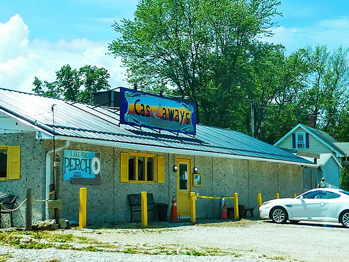 The weathered sign tells you everything: this isn't fancy, but that sunset color palette promises something special awaits inside. Lake Erie vibes done right.