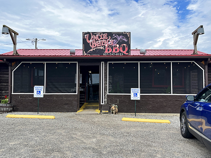 The unassuming exterior of Uncle Beth's BBQ hides culinary treasures within. That little dog might be the unofficial quality control manager!