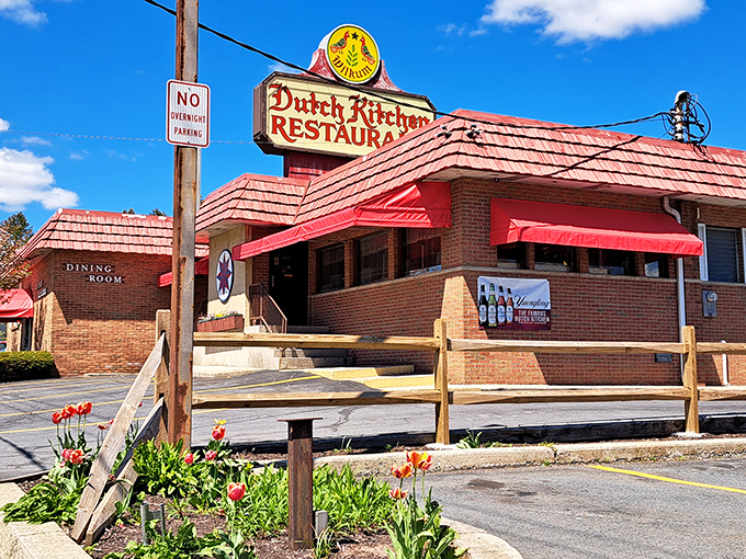 The iconic red-roofed Dutch Kitchen stands like a beacon of comfort food salvation along Route 61, promising Pennsylvania Dutch delights within those brick walls.