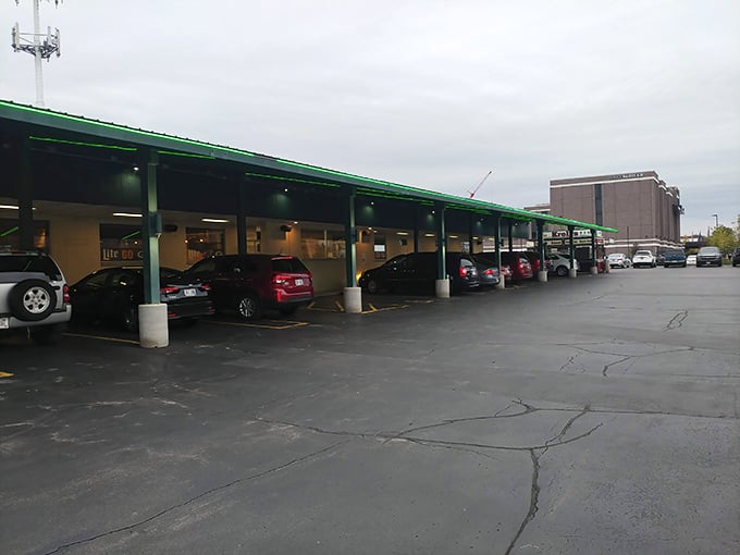 The iconic green-trimmed exterior of Kroll's West stands like a time capsule of Wisconsin dining history, complete with vintage neon sign that beckons hungry travelers.
