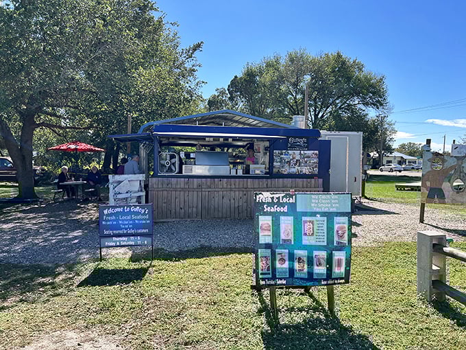 The blue seafood stand that proves paradise doesn't need a dress code. Gulley's unassuming exterior houses seafood treasures that would make Neptune himself swim ashore.