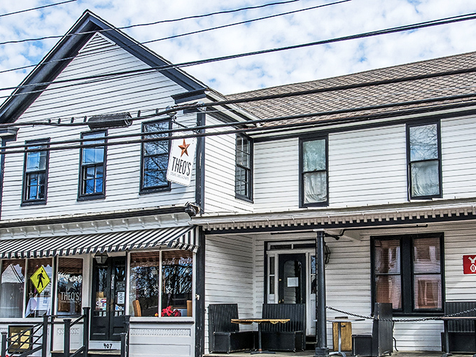 Classic Eastern Shore charm in white clapboard. Theo's unassuming exterior hides culinary treasures within, like finding a pearl in Chesapeake Bay.