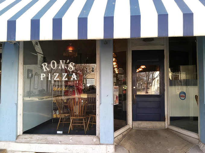 The unassuming storefront of Ron's Pizza in Miamisburg might not stop traffic, but locals know this modest exterior hides pizza treasures worth seeking out.