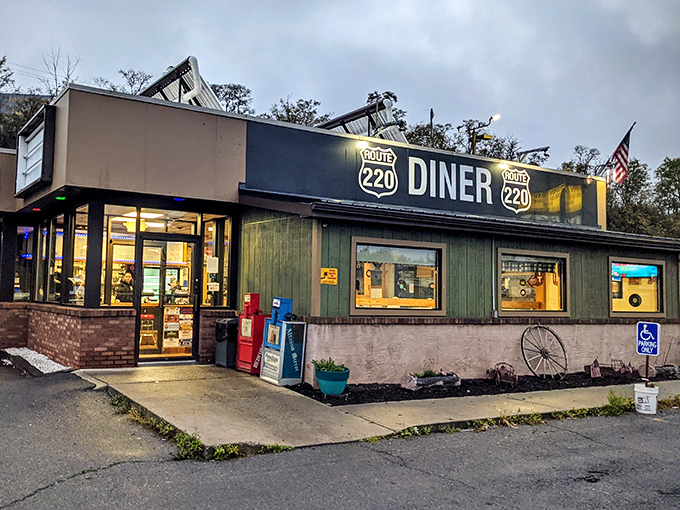 The humble roadside exterior of Route 220 Diner belies the culinary treasures within. Like finding a diamond in Pennsylvania's rolling hills.