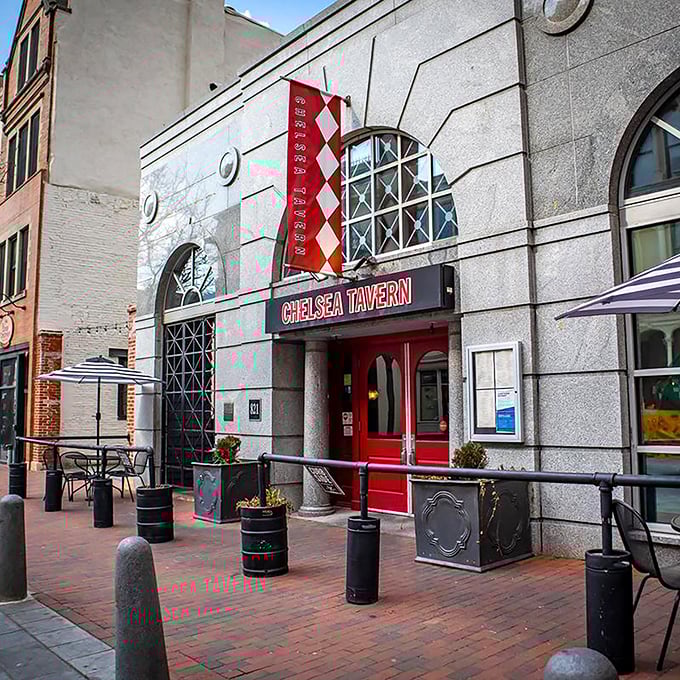The iconic red door of Chelsea Tavern beckons from Market Street, promising culinary adventures behind its historic stone fa&ccedil;ade.