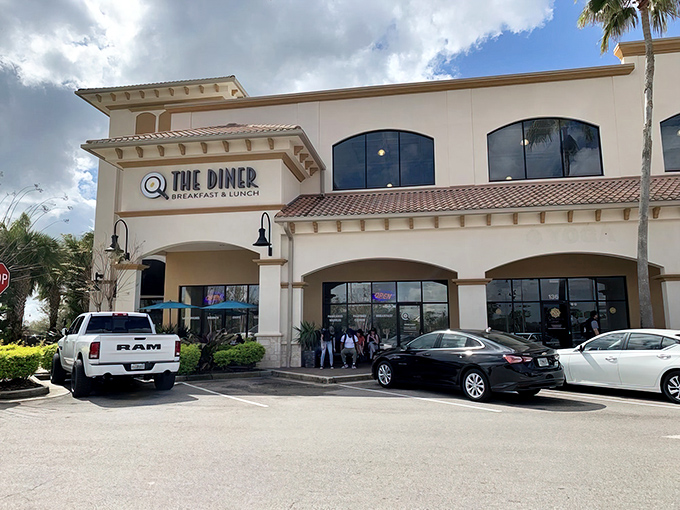 Mediterranean charm meets breakfast paradise at @ The Diner's exterior, where hungry patrons know that culinary magic awaits behind those doors.