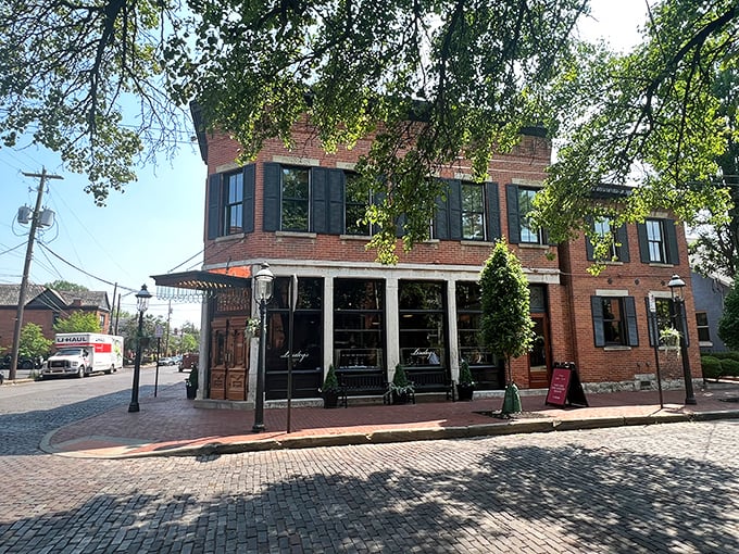 Lindey's brick exterior stands like a culinary lighthouse in Columbus's German Village, beckoning hungry travelers with promises of gastronomic bliss.