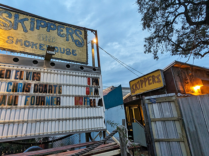 The weathered sign at Skipper's Smokehouse stands like a sentinel of good times, promising Florida flavors with a side of musical magic.