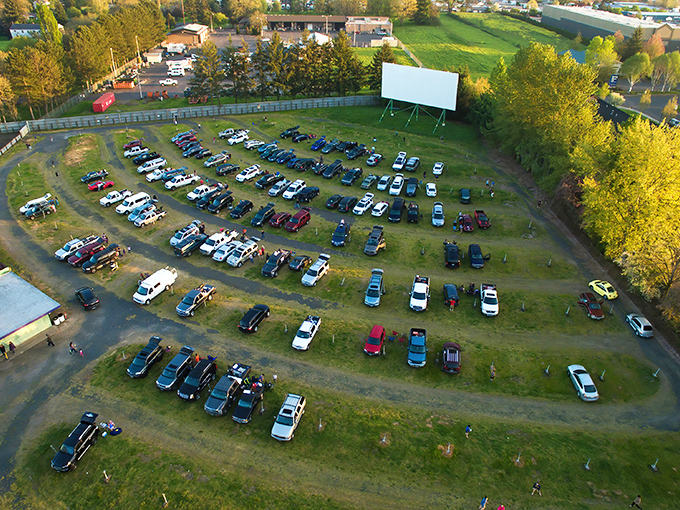 From above, the 99W Drive-In resembles a living museum of Americana&mdash;cars arranged in perfect rows facing that iconic white screen, waiting for dusk's cinematic magic.