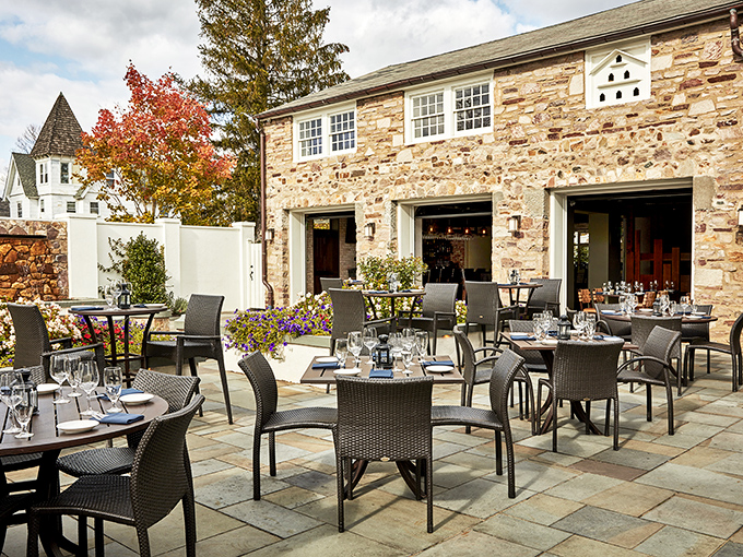 The historic Blue Bell Inn welcomes visitors with colonial charm and vibrant landscaping. A Pennsylvania landmark that whispers "come in and stay awhile."