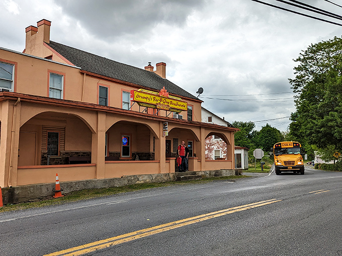 The peach-colored exterior of Grumpy's stands like a barbecue beacon on Route 100, promising smoky treasures within those unassuming walls.