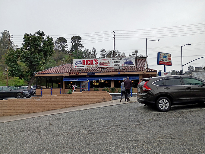 The stucco exterior of Rick's proudly announces its "World Famous" status in Dodgertown, where breakfast dreams come true under that distinctive Spanish-tile awning.