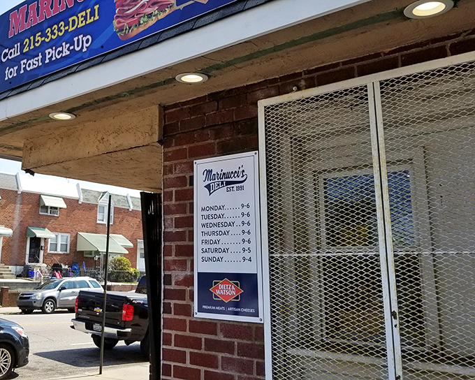 The unassuming brick storefront of Marinucci's Deli stands like a culinary lighthouse in Mayfair, beckoning sandwich enthusiasts with its no-nonsense charm.