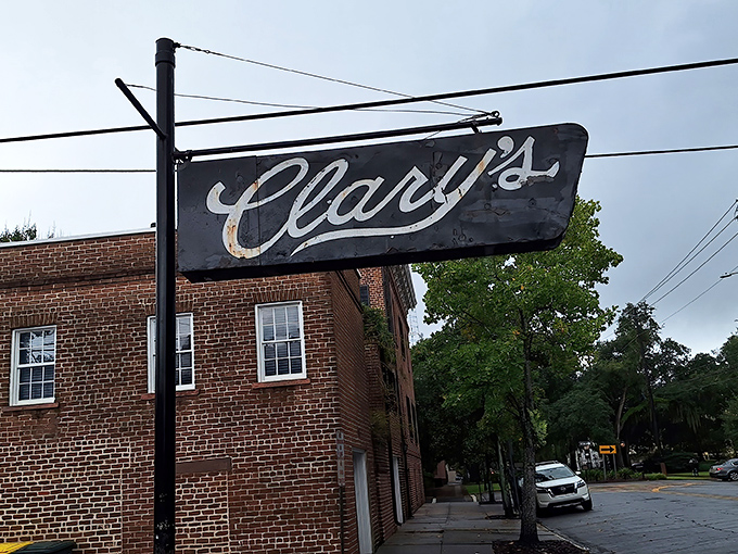 The iconic black sign beckons like an old friend against Savannah's brick backdrop. Some restaurants need flashing lights &ndash; Clary's just needs its reputation. 