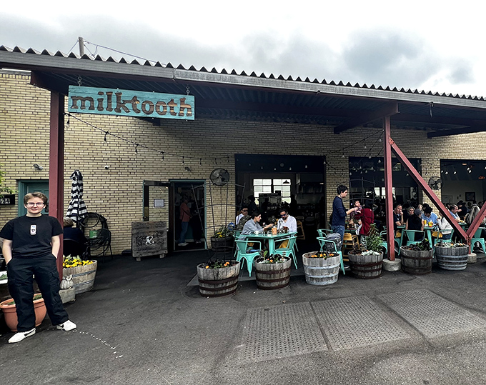 The unassuming exterior of Milktooth belies the culinary magic within. This former auto shop now fixes hunger pangs instead of carburetors.