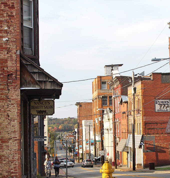 Connellsville's historic downtown reveals itself like a time capsule with brick facades telling stories of past prosperity, waiting for your footsteps to add to its history.