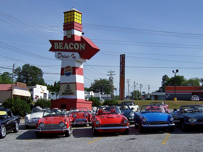 The towering lighthouse-style sign at The Beacon Drive-In stands tall in Spartanburg, guiding visitors to this retro burger haven&mdash;complete with classic cars and serious roadside charm.