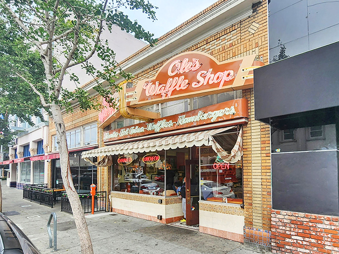 The brick facade of Ole's Waffle Shop stands as a beacon of breakfast hope on Alameda's Park Street, promising comfort food that's outlasted countless food trends.