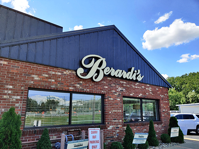 The brick-and-blue exterior of Berardi's stands like a culinary lighthouse on Ohio's north coast, beckoning hungry travelers with its simple promise of excellence.