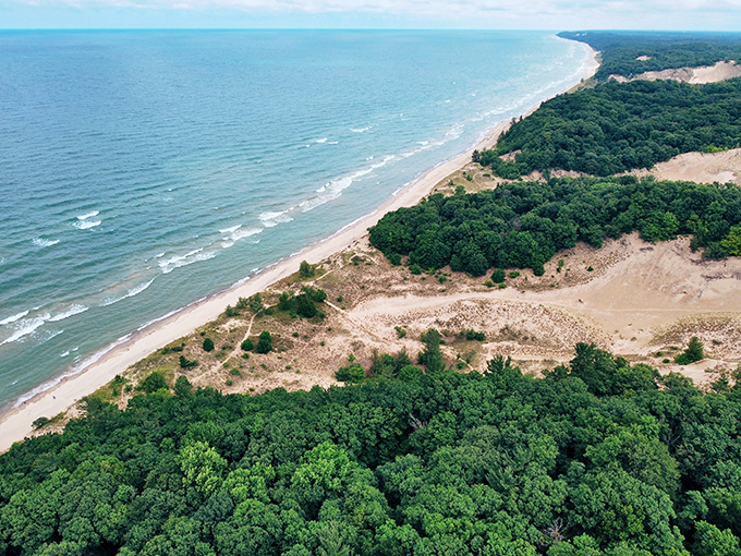 The Great Lakes' answer to the Caribbean &ndash; where Michigan's towering dunes meet Lake Michigan's impossibly blue waters in a landscape that defies Midwestern expectations.