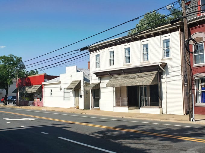 Main Street's historic buildings speak volumes about Middletown's past while housing its vibrant present. The red accents add that perfect touch of small-town charm.