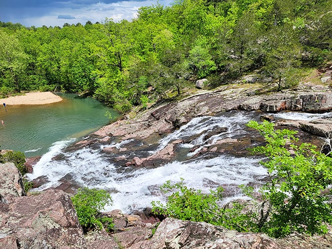 Nature's perfect staircase cascades over billion-year-old rhyolite rock. Missouri showing off with water ballet that would make Esther Williams jealous.
