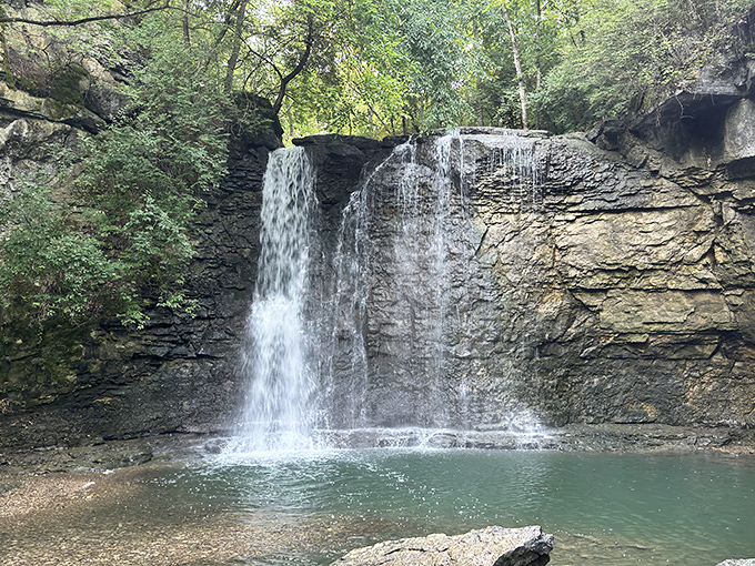 Nature's own magic show! The 35-foot cascade of Hayden Falls creates a mesmerizing display as water tumbles over ancient limestone, carving its story into the Ohio landscape.