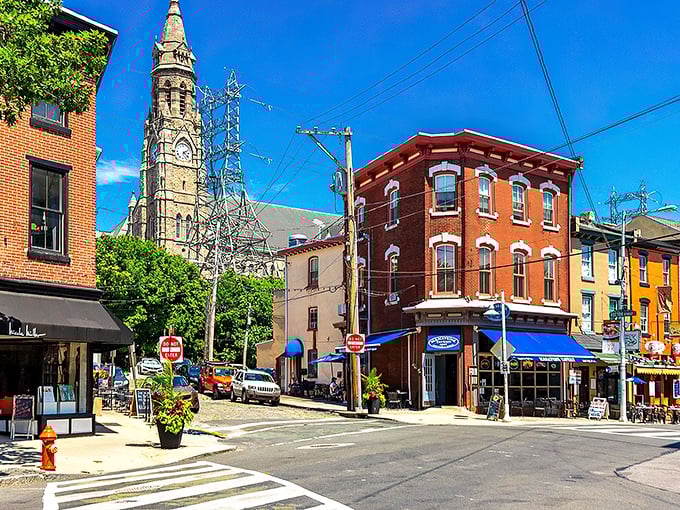 St. John the Baptist Church towers over Manayunk's colorful row houses like a European cathedral that somehow landed in Pennsylvania. Old-world charm meets new-world vibrancy.