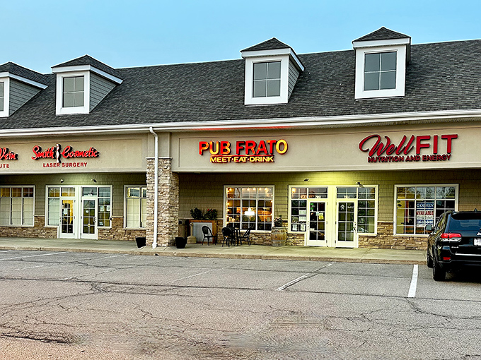 Strip mall surprise! Pub Frato's unassuming exterior hides culinary treasures within, proving that great food doesn't need fancy real estate to shine.