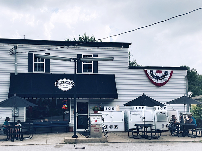 The classic white clapboard exterior with its bold black awning stands as a time capsule in rural Ohio. No fancy marketing needed when the sandwiches speak for themselves.