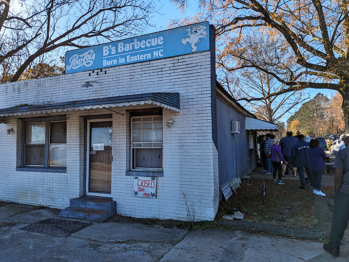 The white brick exterior of B's Barbecue stands like a humble temple to smoked meat. No frills necessary when the food speaks this loudly.