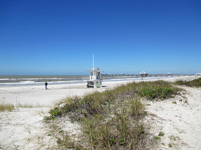 Mother Nature's finest sandbox stretches before you at Clearwater Beach, where the powdery white sand meets crystal-clear Gulf waters under an impossibly blue Florida sky.