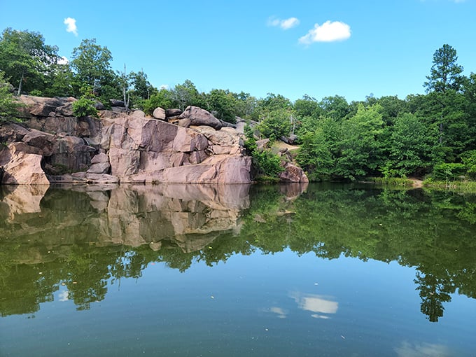 Nature's own sculpture garden where massive pink granite boulders stand sentinel over the Missouri landscape, inviting explorers of all ages to marvel at geological artistry.