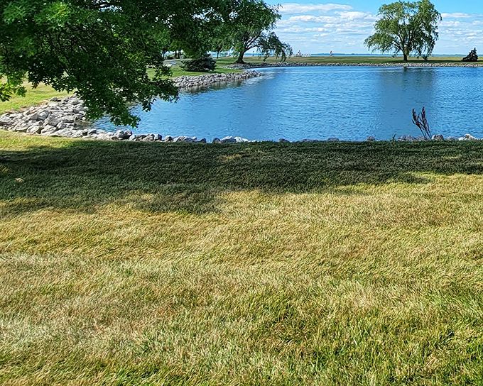 The fountain's gentle spray creates nature's own water show against the backdrop of Lake Erie's blue canvas. Serenity with special effects. 