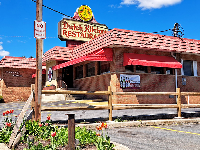 The iconic red-roofed Dutch Kitchen stands proudly along Route 61, like a beacon of comfort food calling weary travelers home.