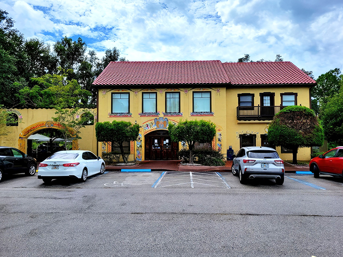 The sunshine-yellow exterior of Yalaha Bakery isn't just a building—it's a promise of the German delights waiting inside. Those hand-painted folk designs aren't fooling around.