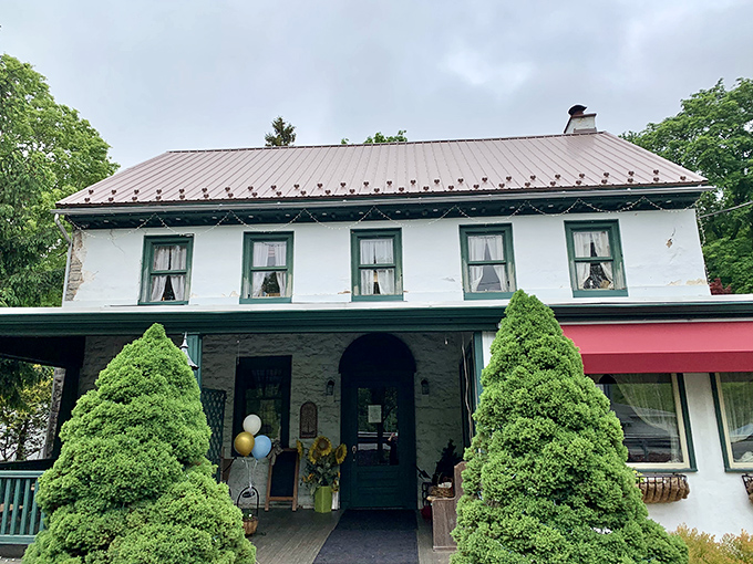 The historic charm of Carriage House welcomes you with symmetrical evergreens standing guard like culinary sentinels at Pennsylvania's prime rib paradise.