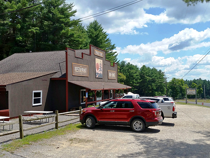 Rustic charm meets culinary excellence at Trail's End, where towering pines stand guard over this unassuming treasure in Cooksburg's wilderness.
