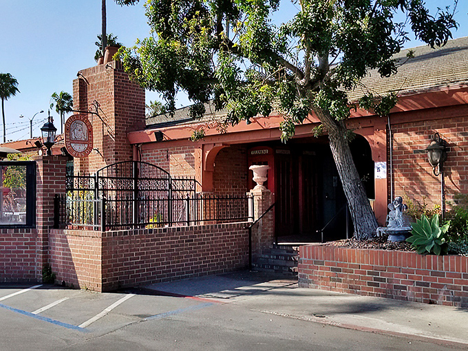 The brick fortress of flavor stands unassumingly in Irvine, its entrance promising old-world charm that feels delightfully out of place among California's palm trees.