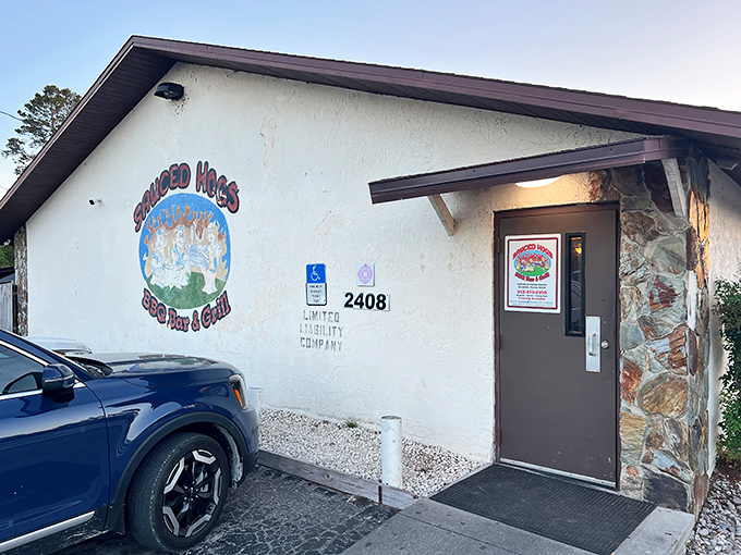 The unassuming exterior of Sauced Hogs promises no frills, just thrills for your taste buds. Like finding a treasure map where X marks the spot for BBQ gold.