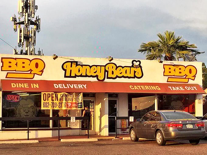 The unassuming yellow storefront of Honey Bear's BBQ stands like a beacon of smoky promise in the Phoenix sun.